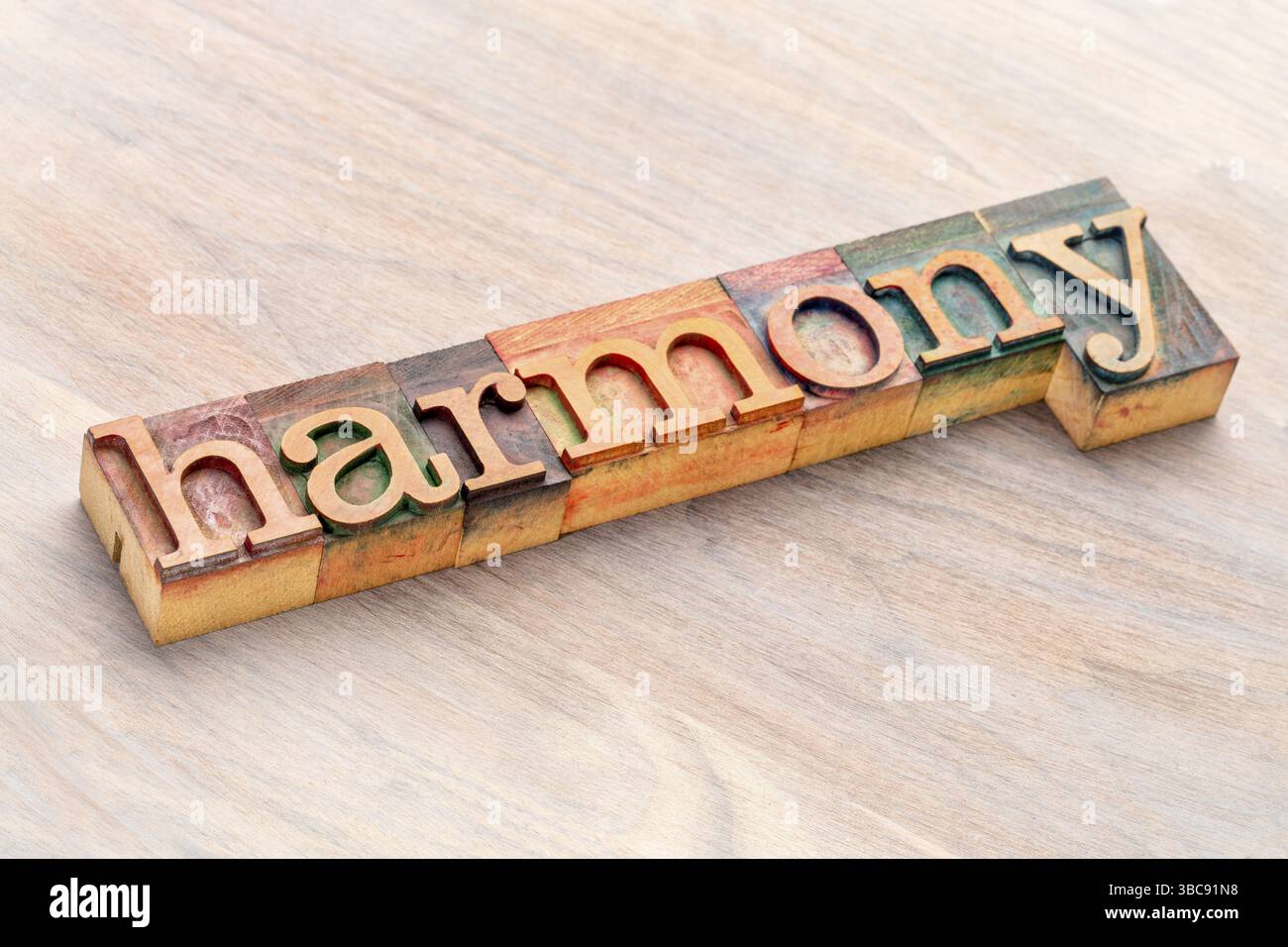 Harmony word abstract in letterpress wood type blocks stained by color ...