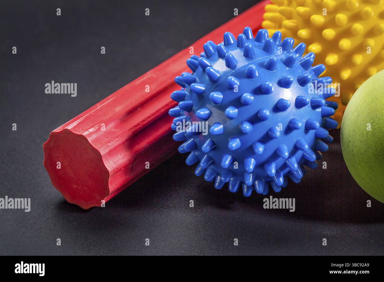 Self massage and reflexology therapy concept - a set of small rubber ...