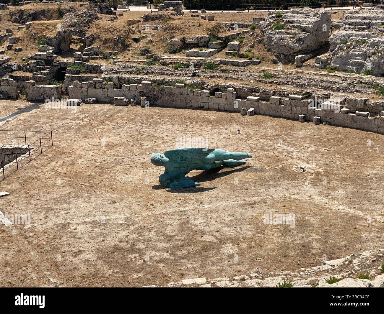 Fallen Icarus statue lying on the ground inside the Greek Theatre of ...