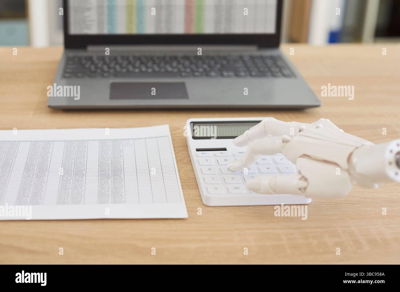 Robotic hand, mechanical arm on calculator, accounting machining ...