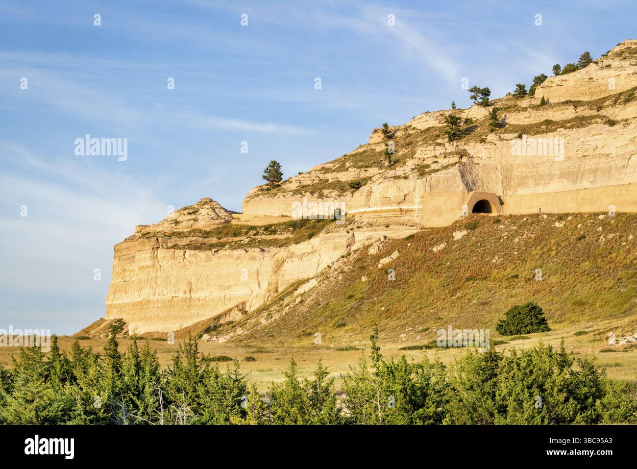 Scotts Bluff National Monument with summit road as seen in sunset light ...