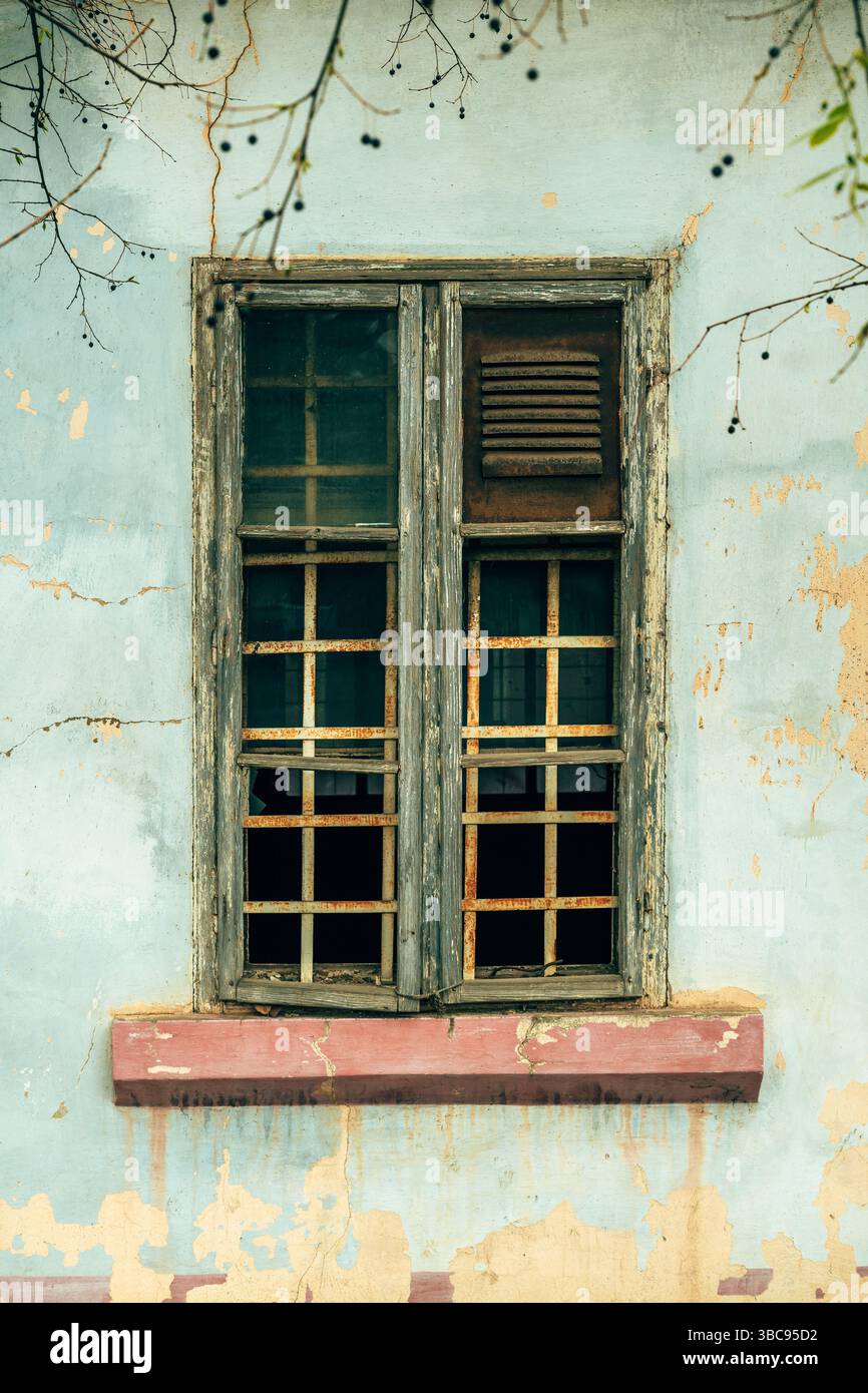 Old broken wooden window of an ruined house, vertical image Stock Photo ...