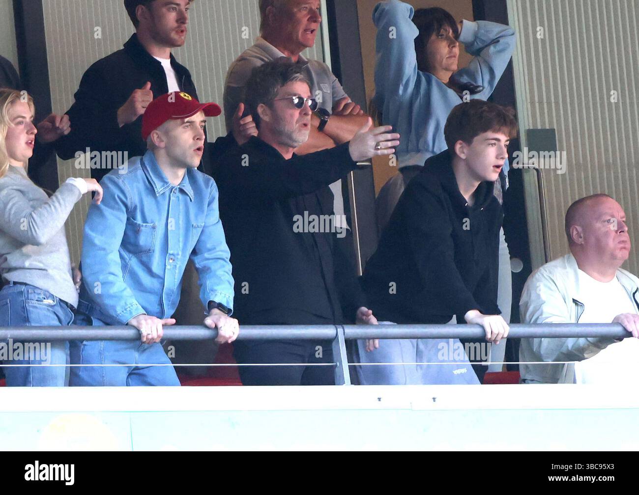 Oasis star and City fan Noel Gallagher is dejected after Dean Henderson ...