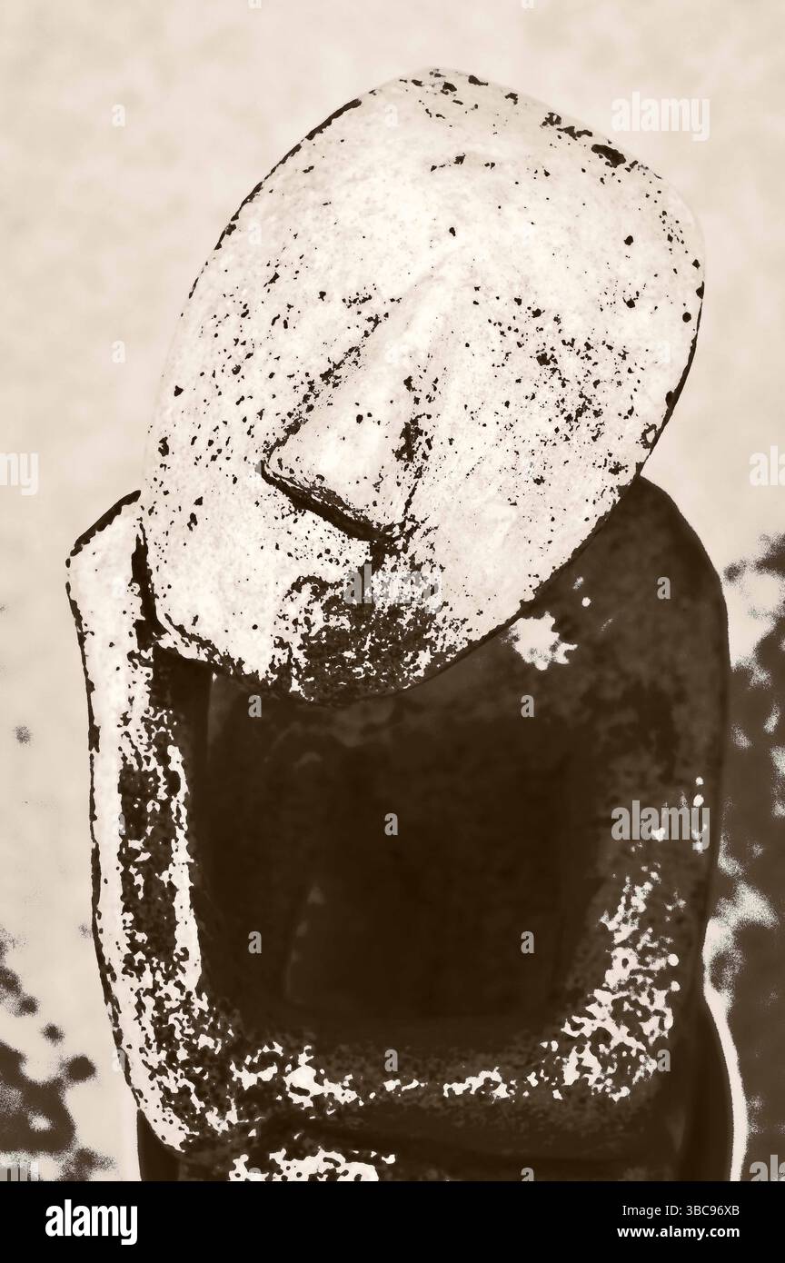 Graphic sepia image of absttract sculpture of person leaning forward ...