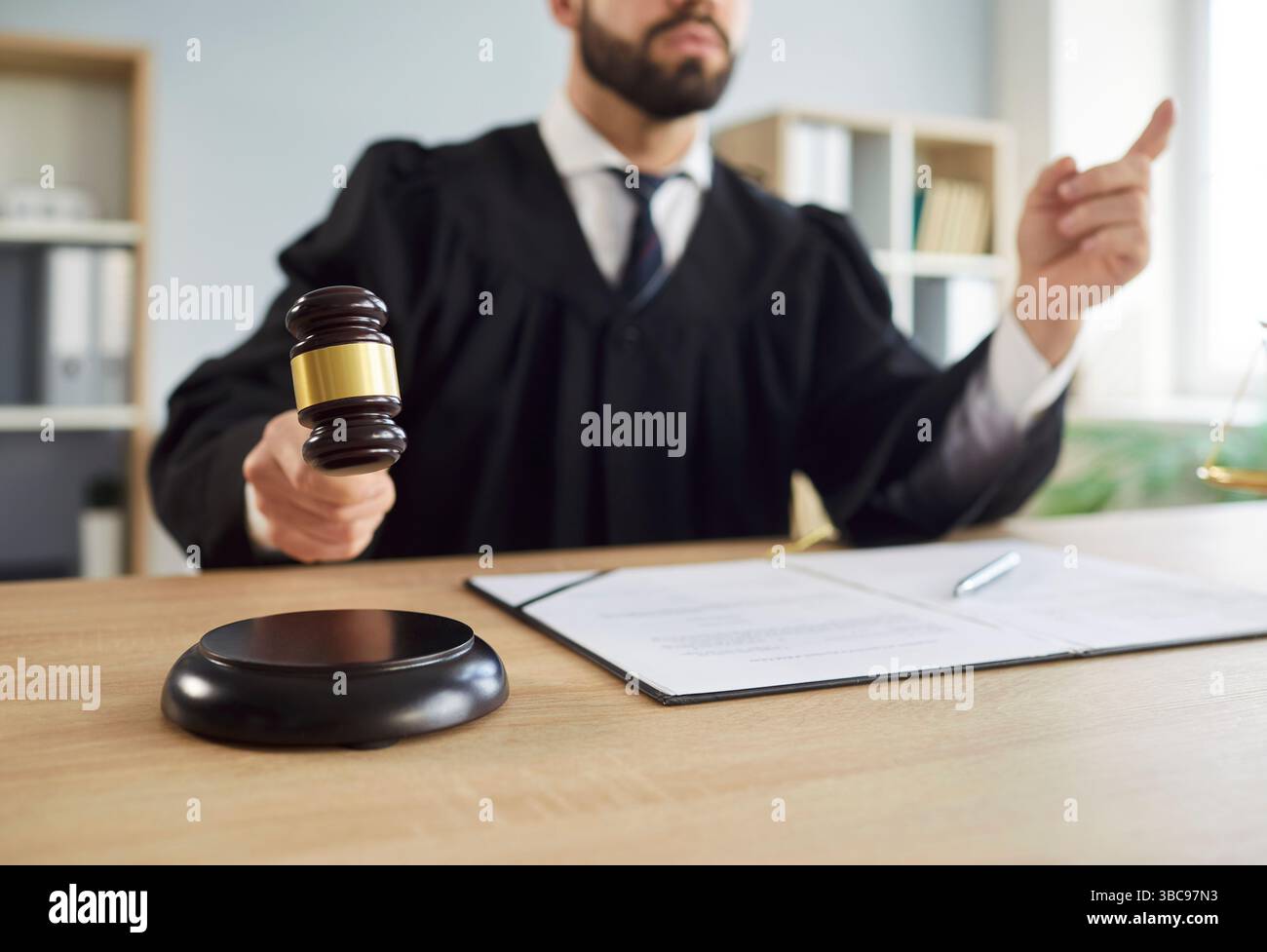 Gavel wooden hammer bangs, judge sentences in court of law, accuses ...