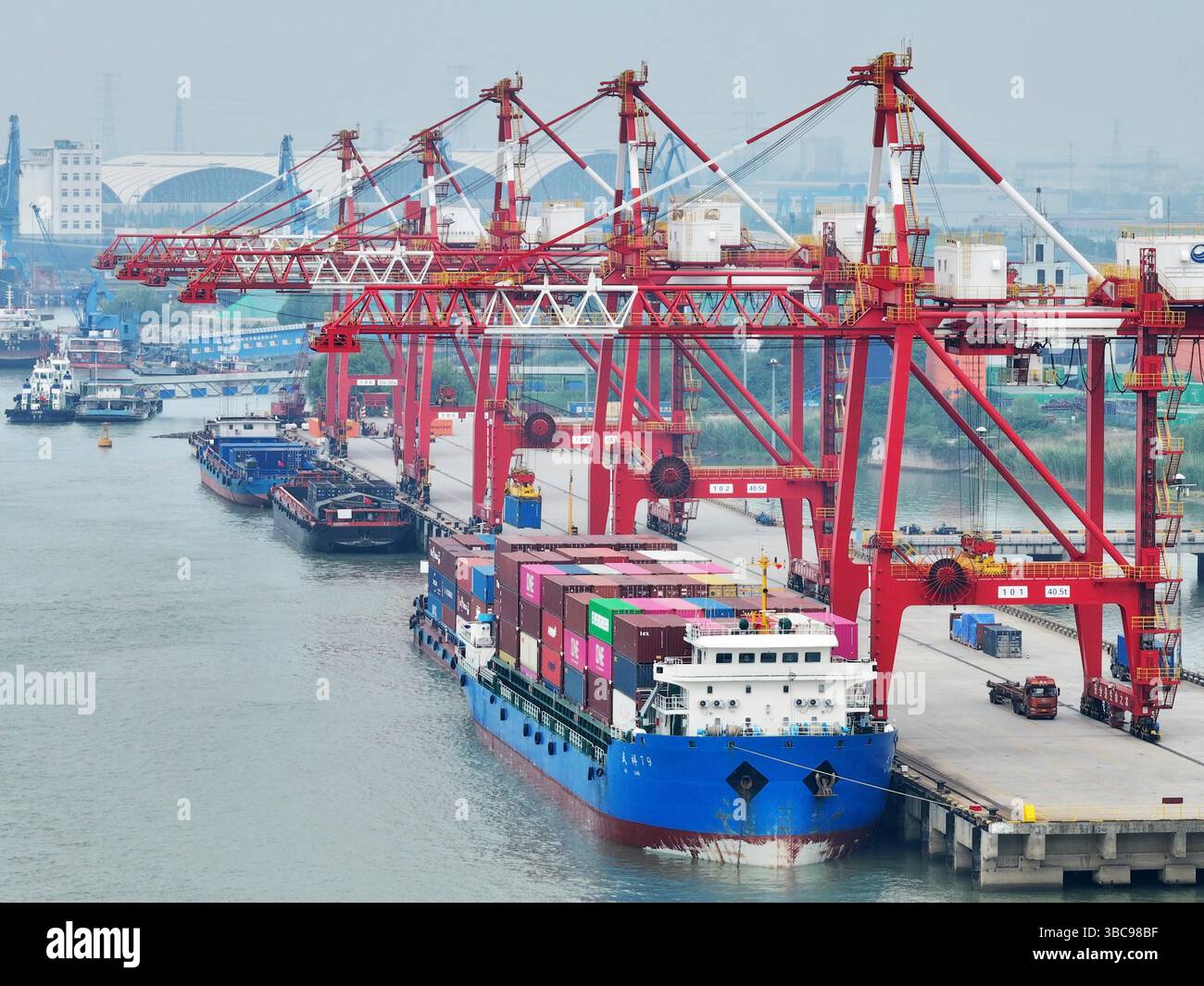 Aerial photo shows the busy container terminal at Yangzhou Port in ...