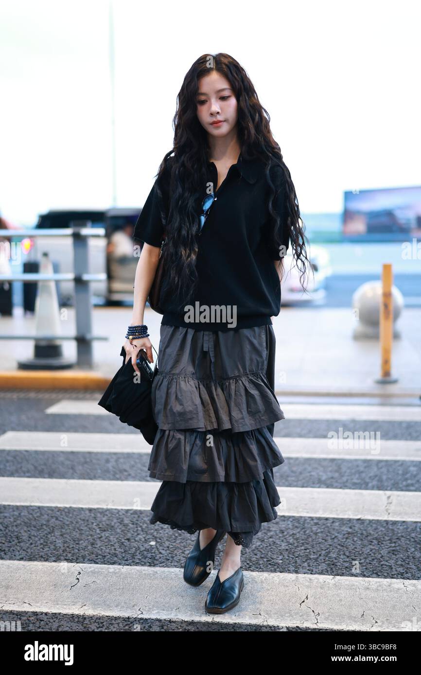 Chinese actress, singer and dancer Song Yanfei appears at the airport ...