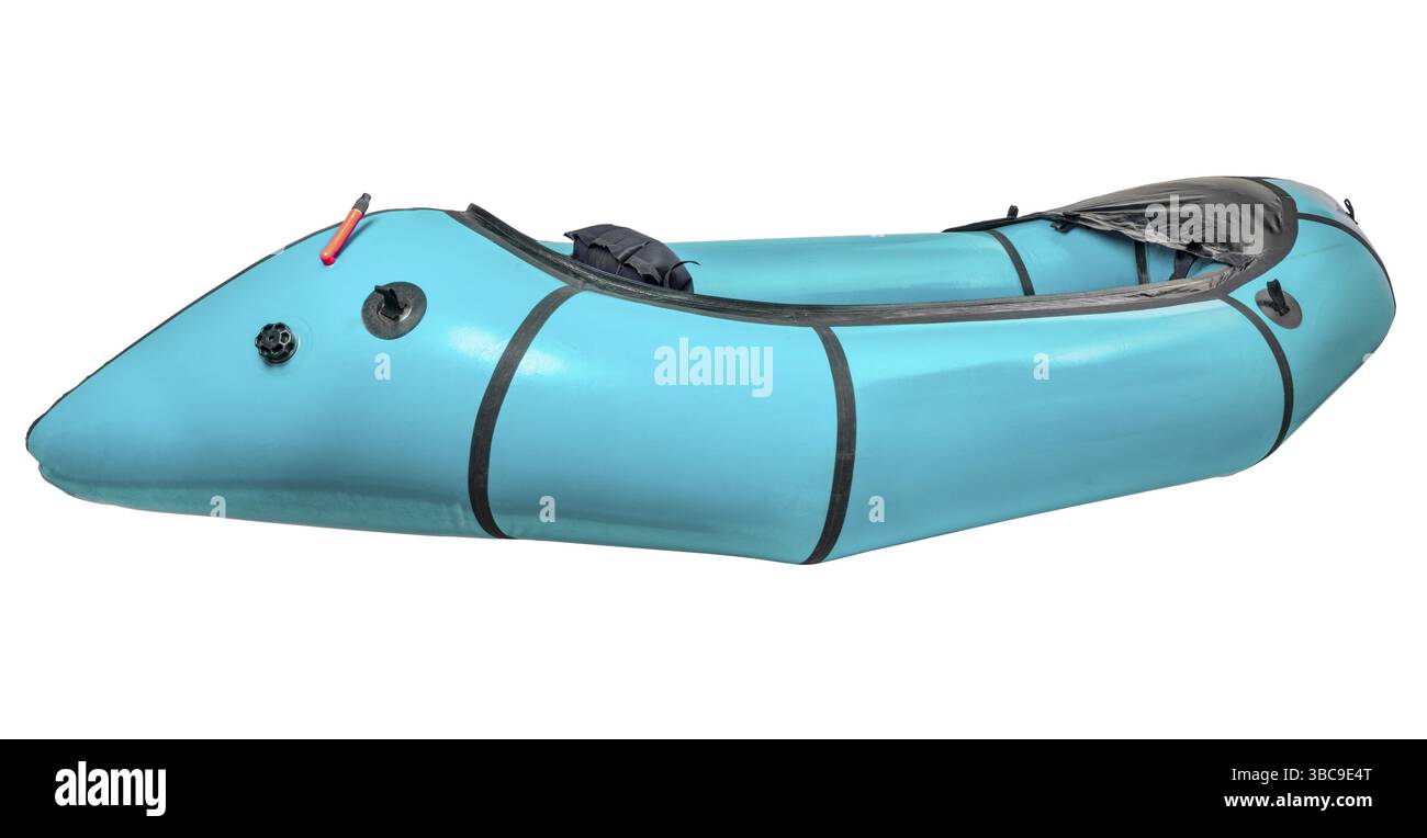 A teal inflatable packraft (one-person light raft used for expedition ...