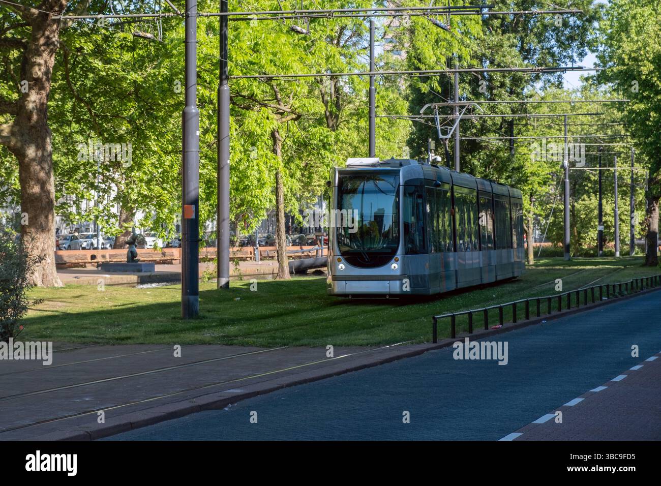 Tram in Rotterdam city, public transportation in town, sunny day in ...