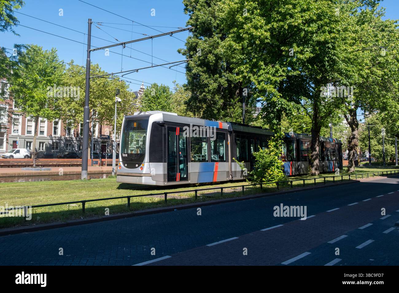 Tram in Rotterdam city, public transportation in town, sunny day in ...
