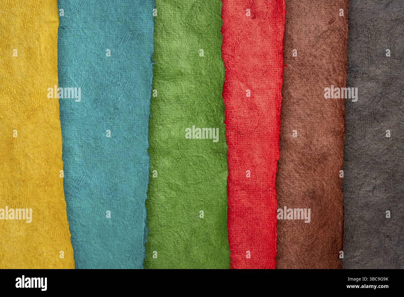 Collection of colorful handmade Huun Mayan paper sheets created by ...