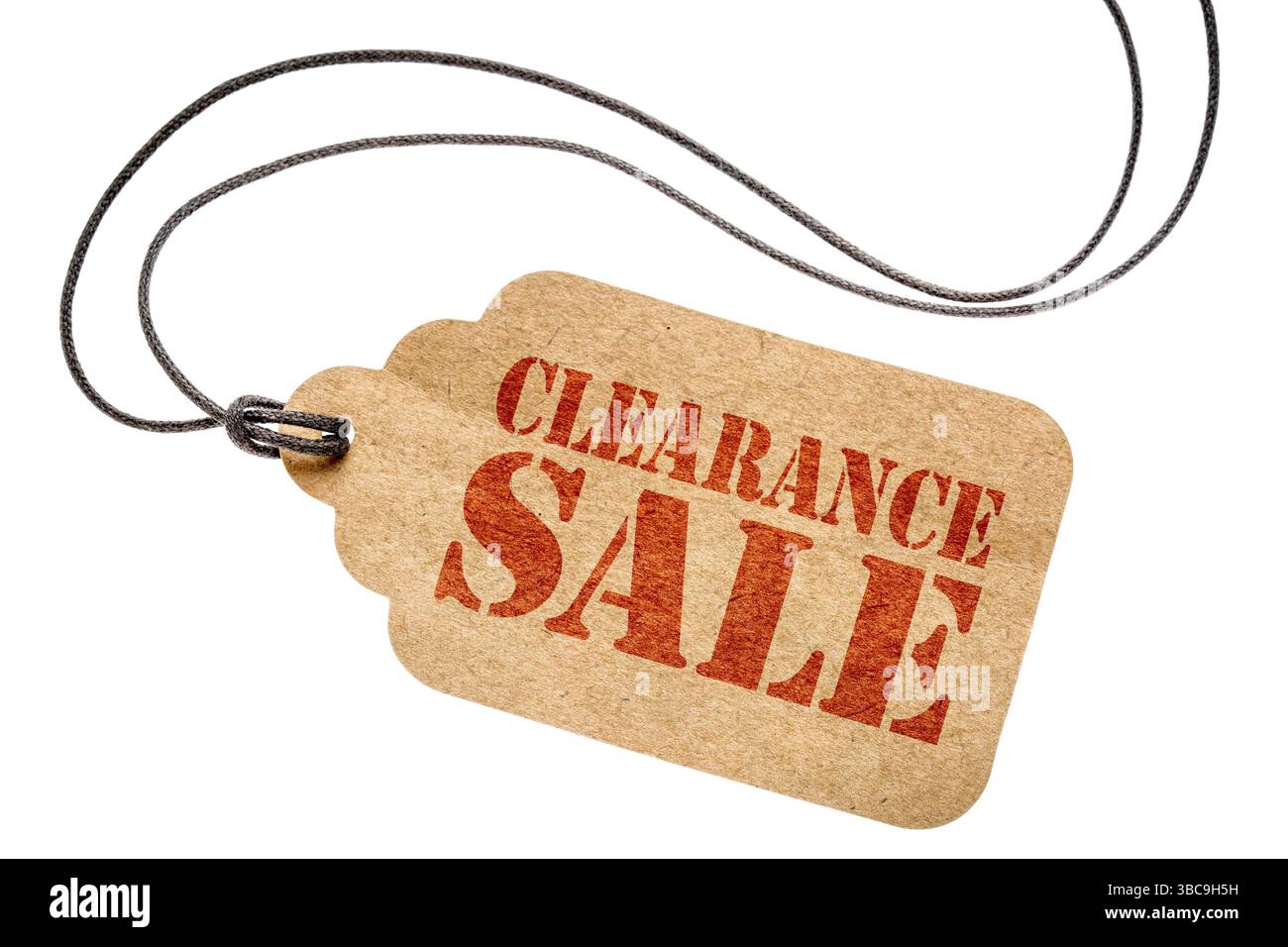 Clearance sale sign - a paper price tag with twine isolated on white ...