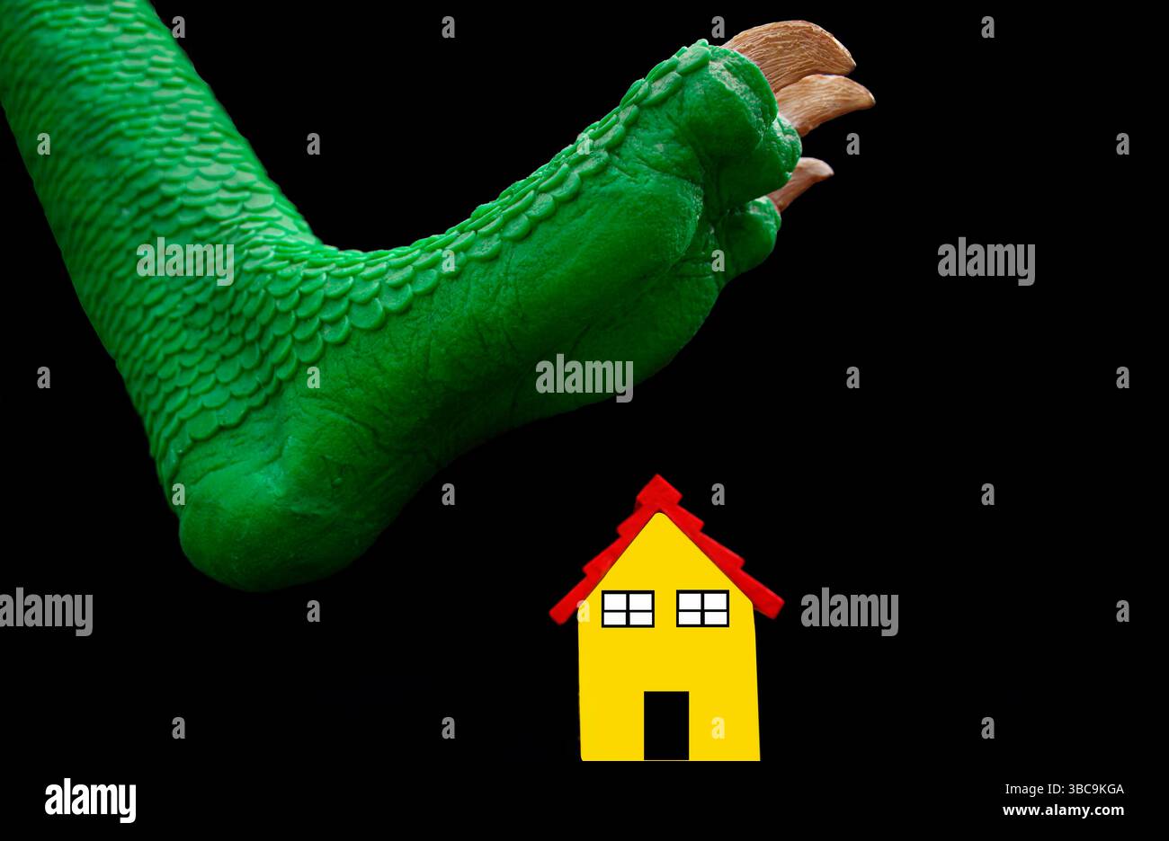 Monster foot close to crushing House Stock Photo - Alamy