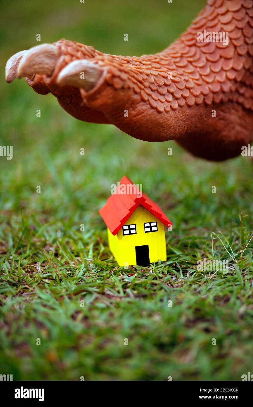 Monster foot close to crushing House Stock Photo - Alamy