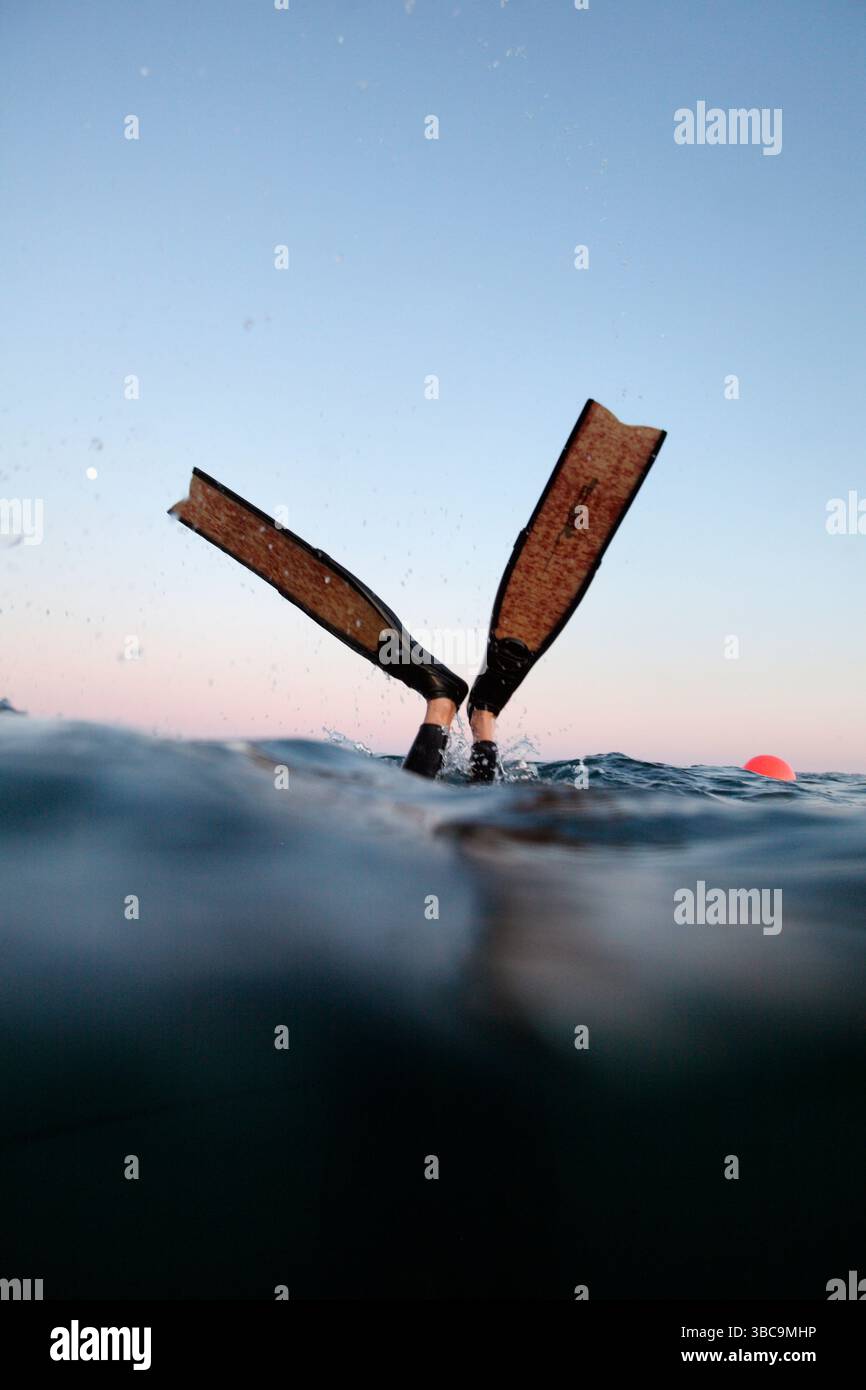 Diver on surface foot hi-res stock photography and images - Alamy