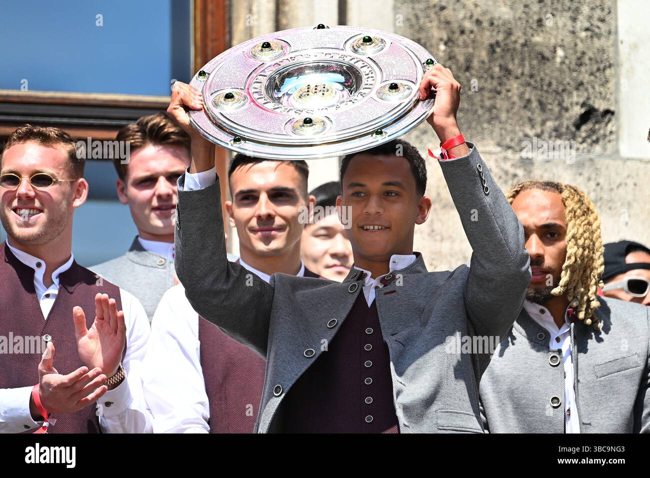 Tarek BUCHMANN (FC Bayern Munich) celebrates on the town hall balcony ...