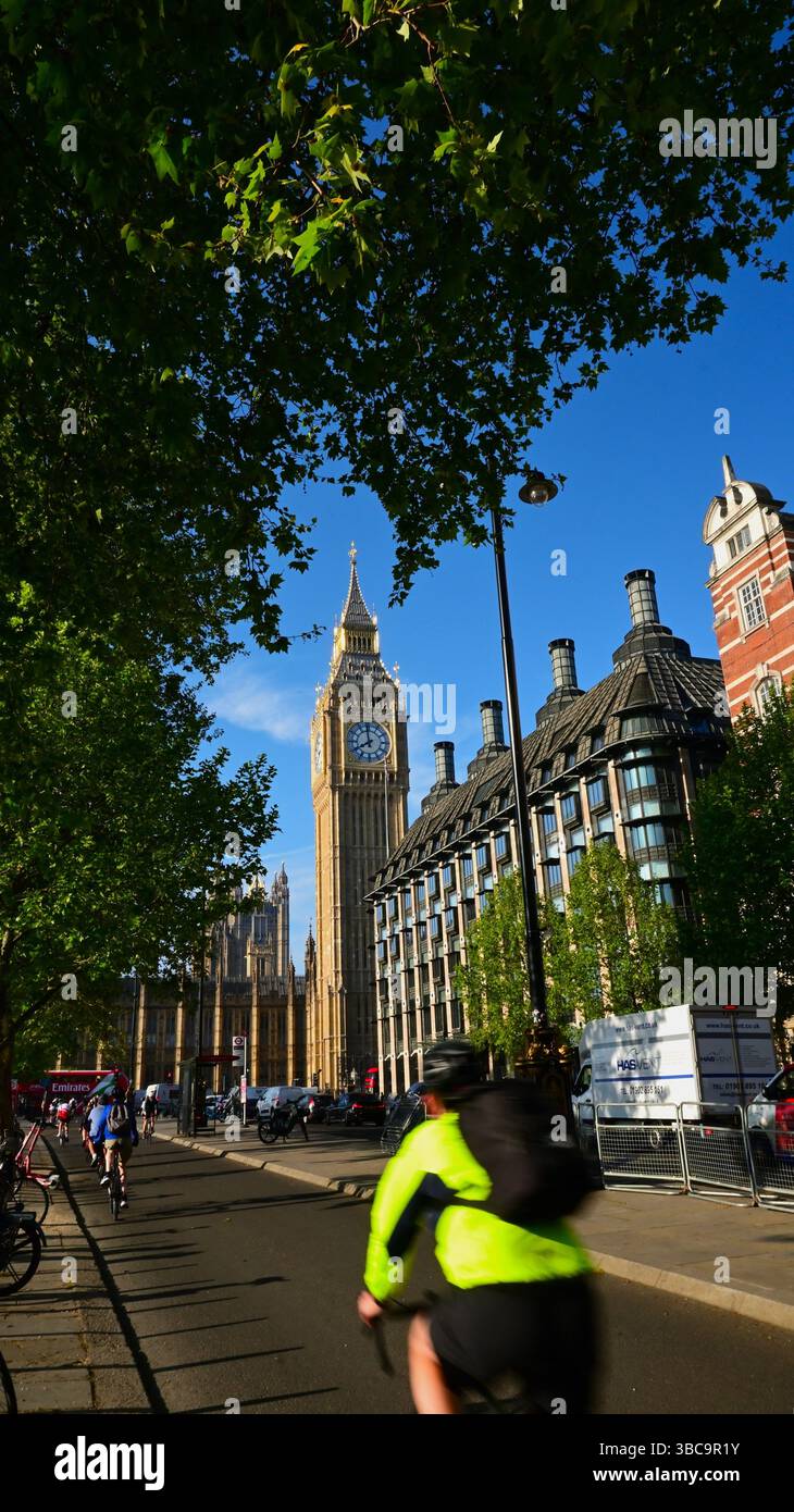 Cyclists on the Victoria Embankment heading to Big Ben (The Great Clock ...