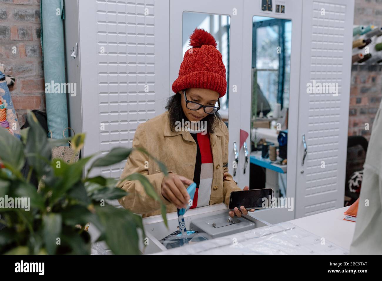 African american women shop assistant hi-res stock photography and ...