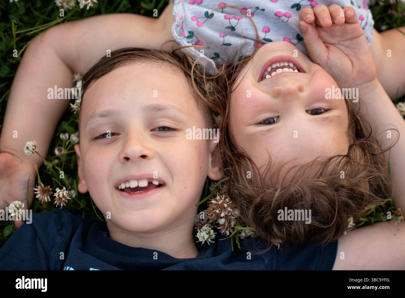 Teen boy laying grass hi-res stock photography and images - Alamy