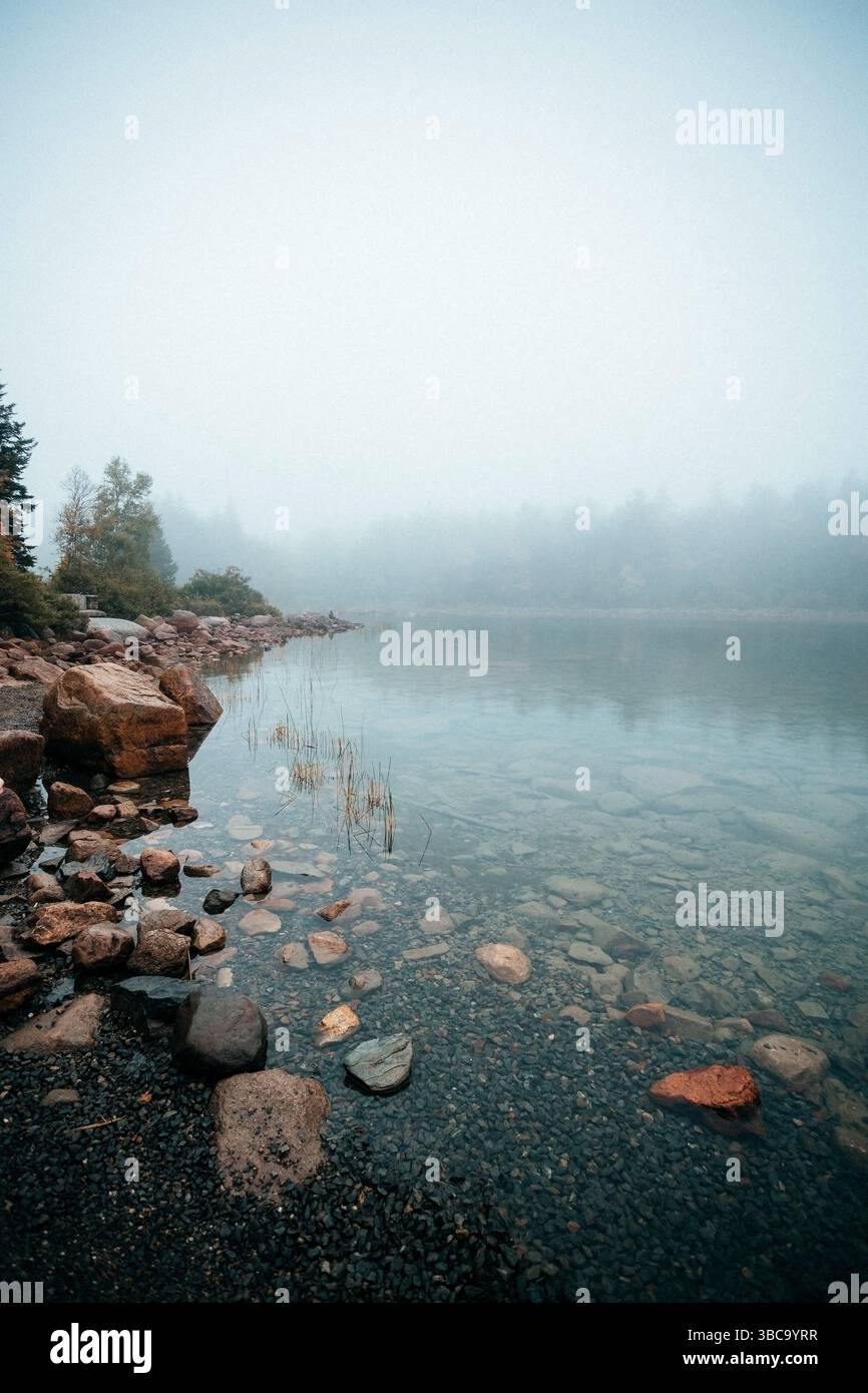 Misty shoreline of Jordan Pond in Acadia National Park Stock Photo - Alamy