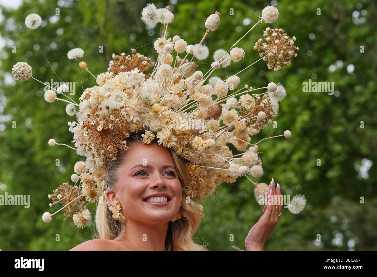 Model and dancer Tasha Ghouri poses as she wears a head piece for The ...