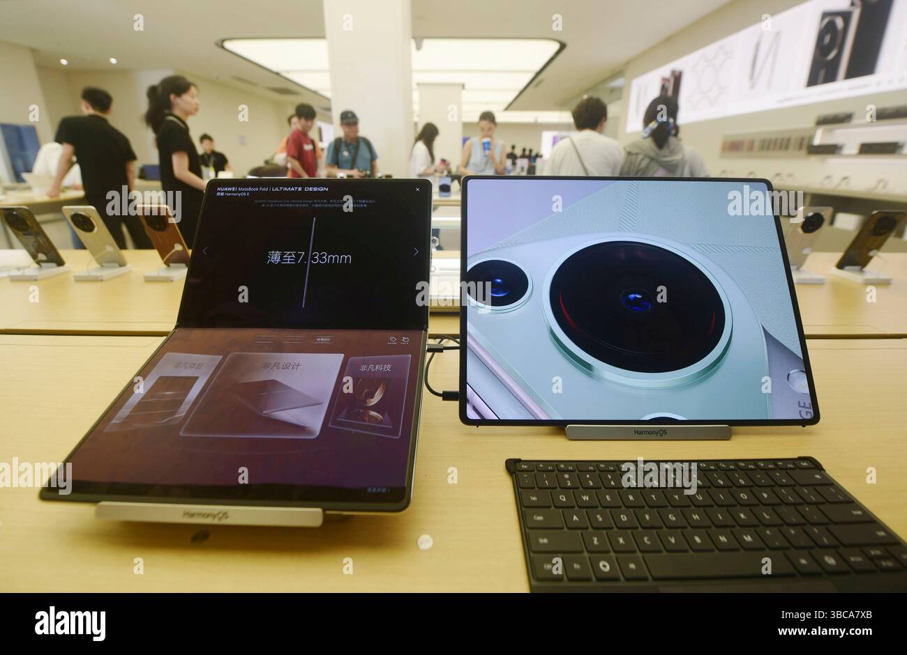 A view of two Huawei Matebook Fold computers, which can be unfolded ...