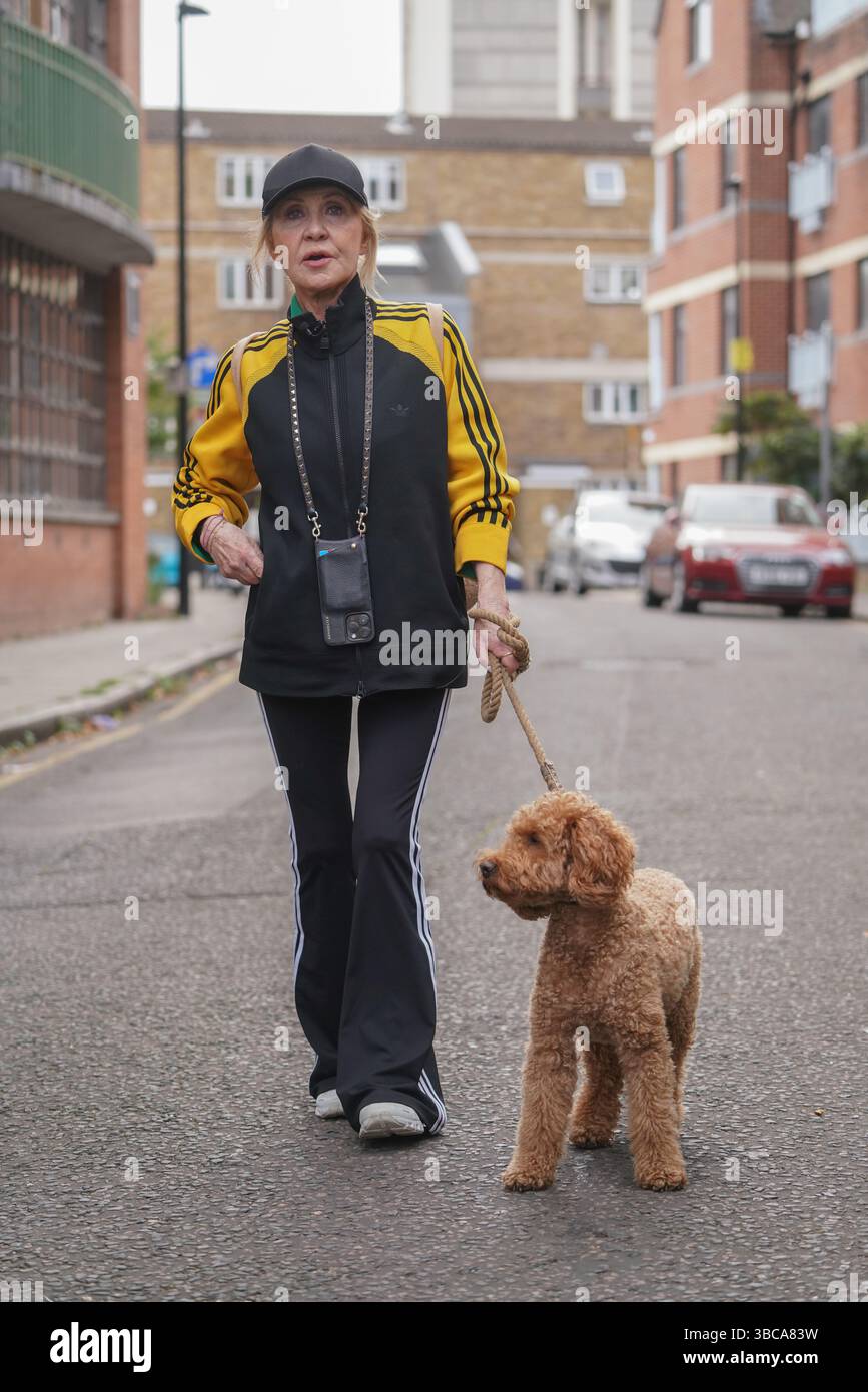 London, UK. 19 May 2025. Singer and songwriter Lulu poses with her dog ...