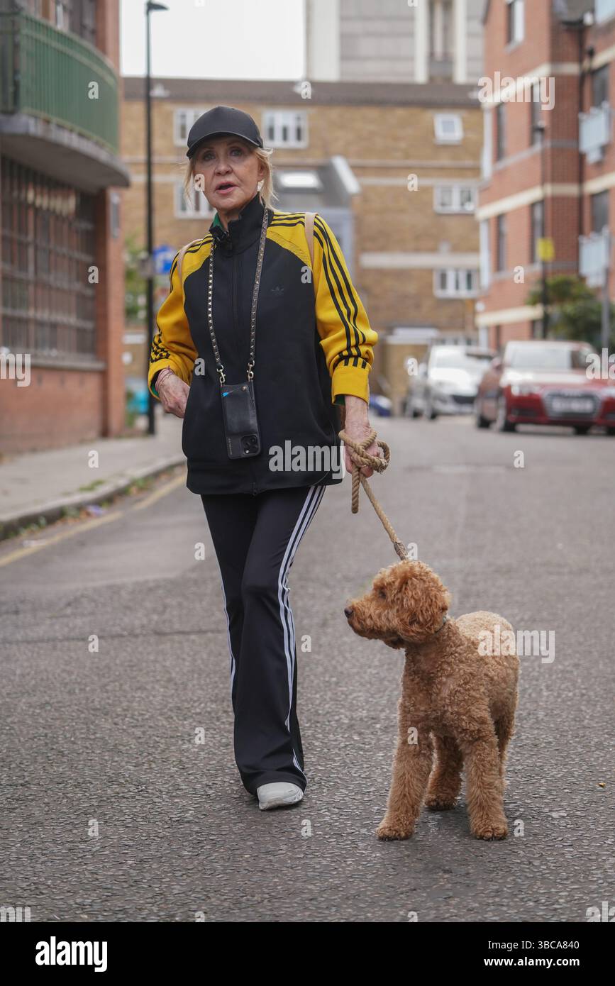 London, UK. 19 May 2025. Singer and songwriter Lulu poses with her dog ...