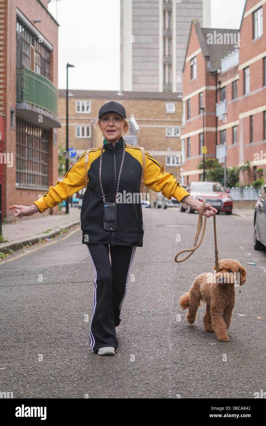 London, UK. 19 May 2025. Singer and songwriter Lulu poses with her dog ...