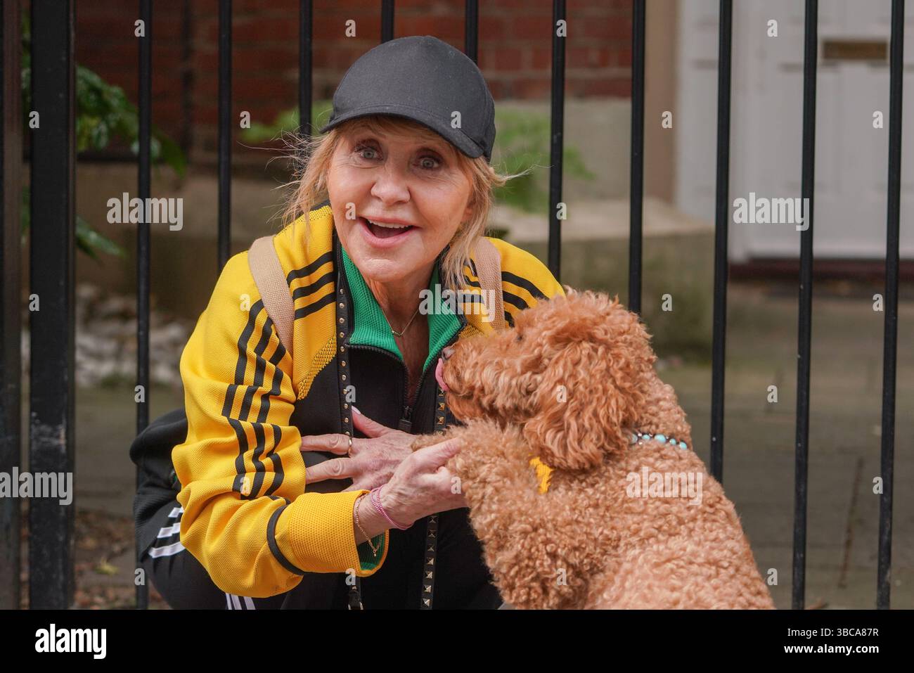 London, UK. 19 May 2025. Singer and songwriter Lulu poses with her dog ...