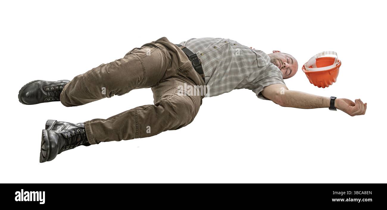 Construction worker lying down after workplace accident Stock Photo - Alamy
