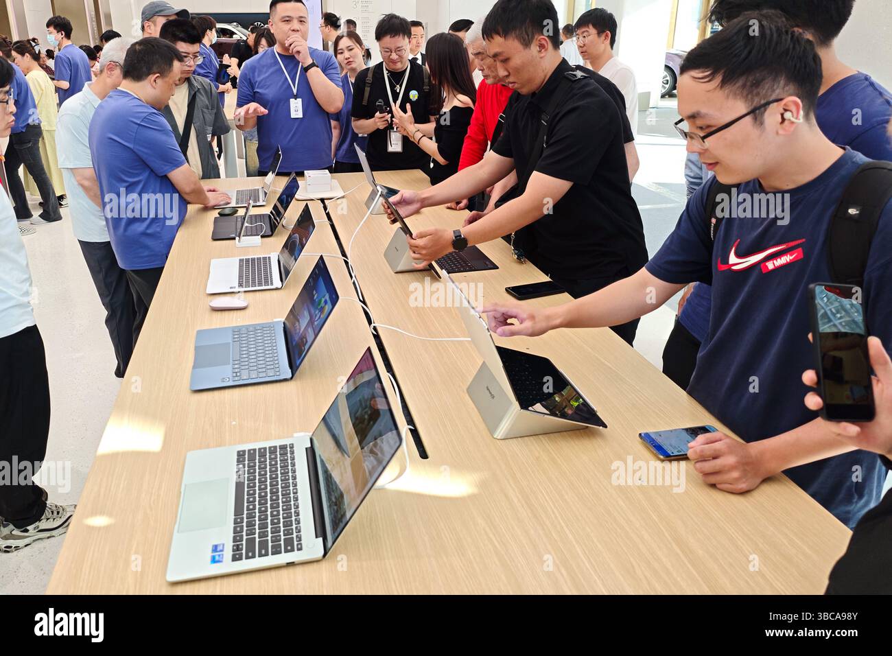 SHANGHAI, CHINA - MAY 19, 2025 - Customers experience Huawei's newly ...