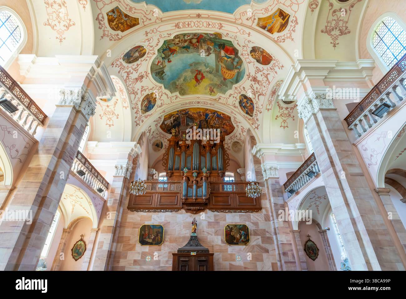 Baroque interior of Saint Maurice church in Ebersmunster village ...