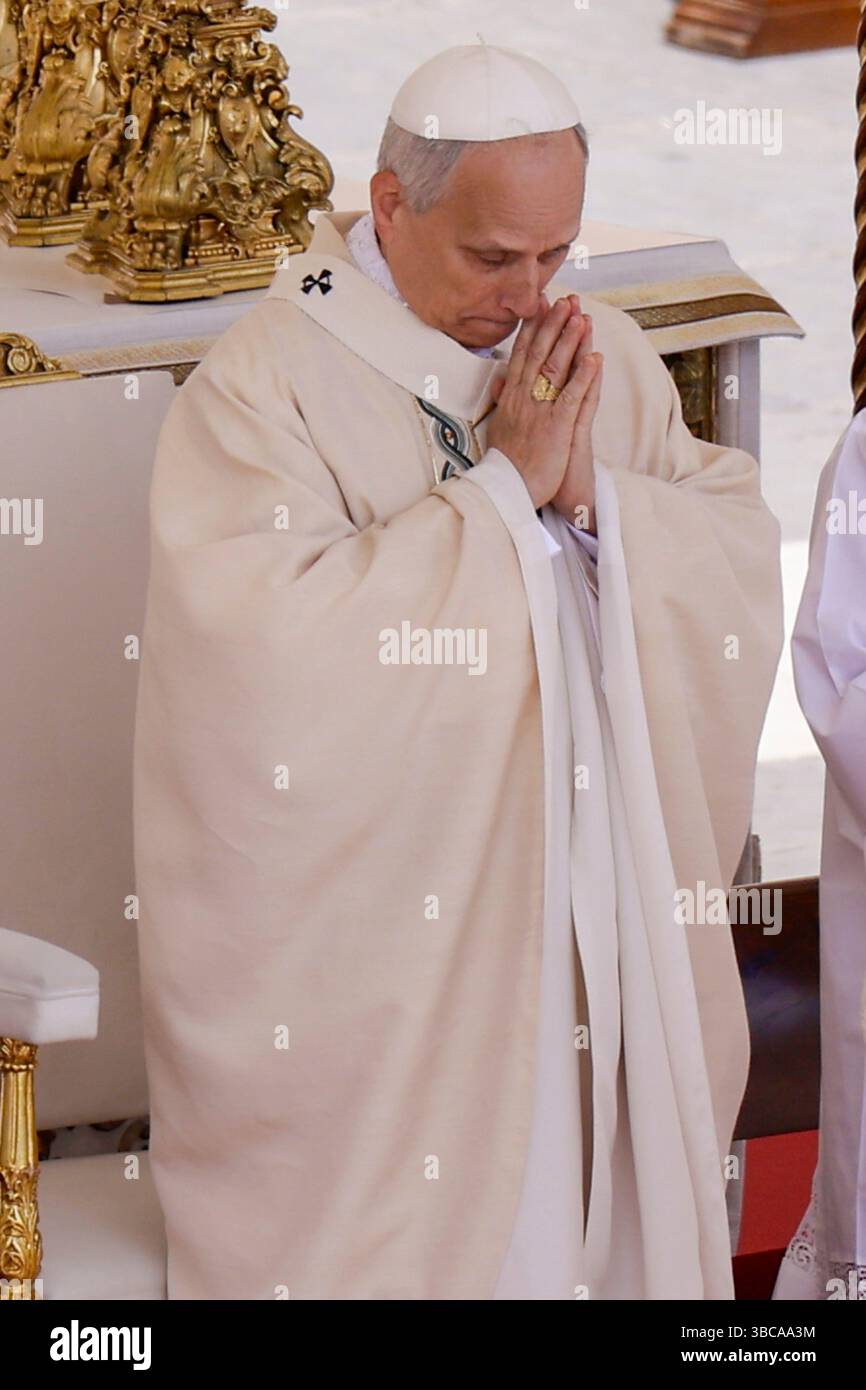 Pope Leo XIV receives the pallium and Fisherman's Ring on a finger ...