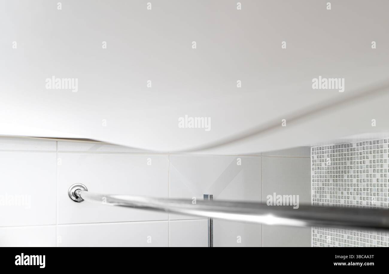 Stretch Ceiling Sagging from Water Leak in Bathroom Stock Photo - Alamy