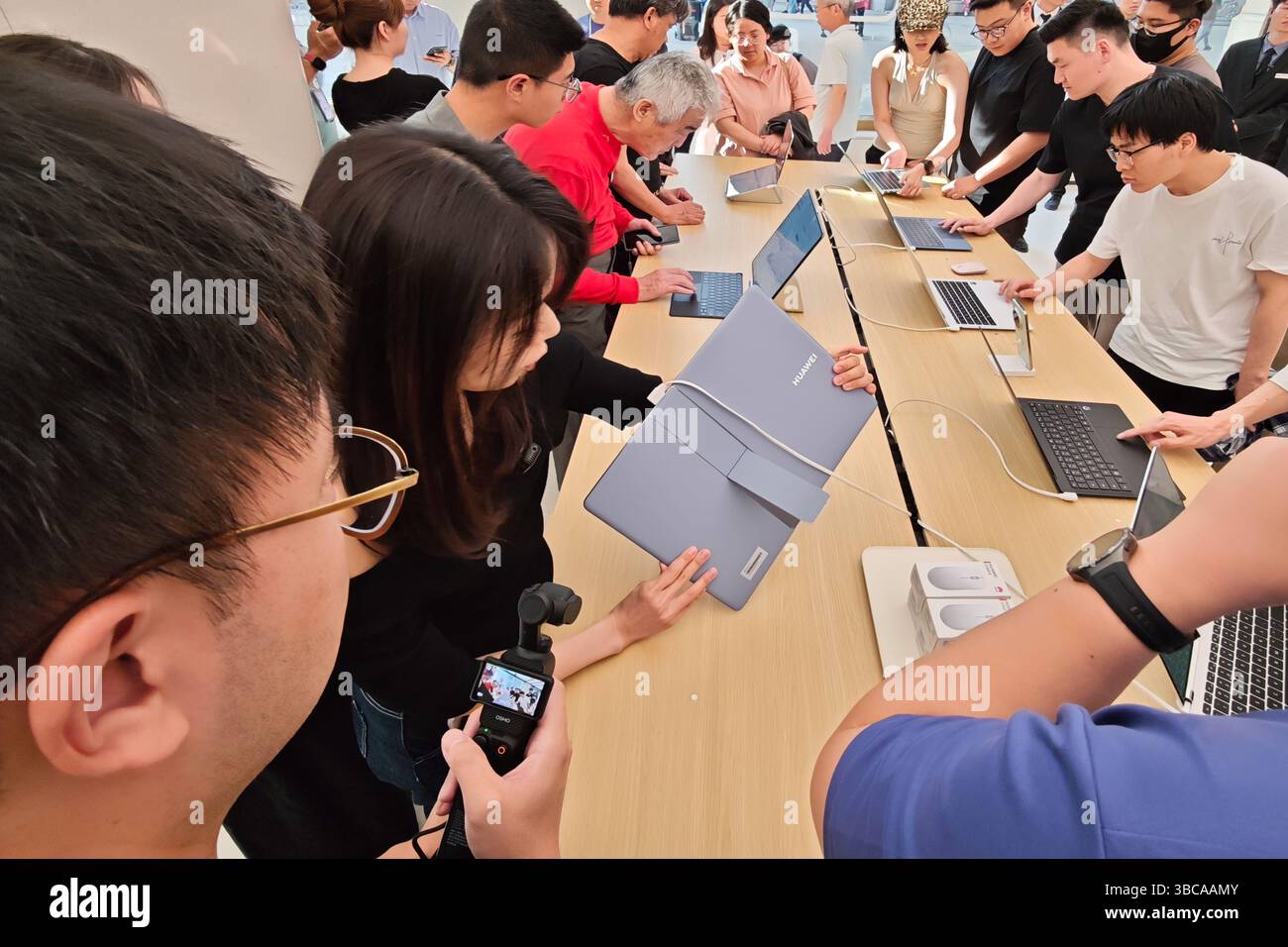 SHANGHAI, CHINA - MAY 19, 2025 - Customers experience Huawei's newly ...