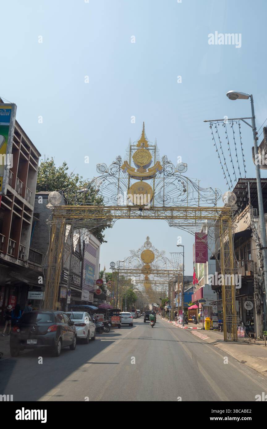 Thai overhead traffic gantry decorated with celebration decorations in ...