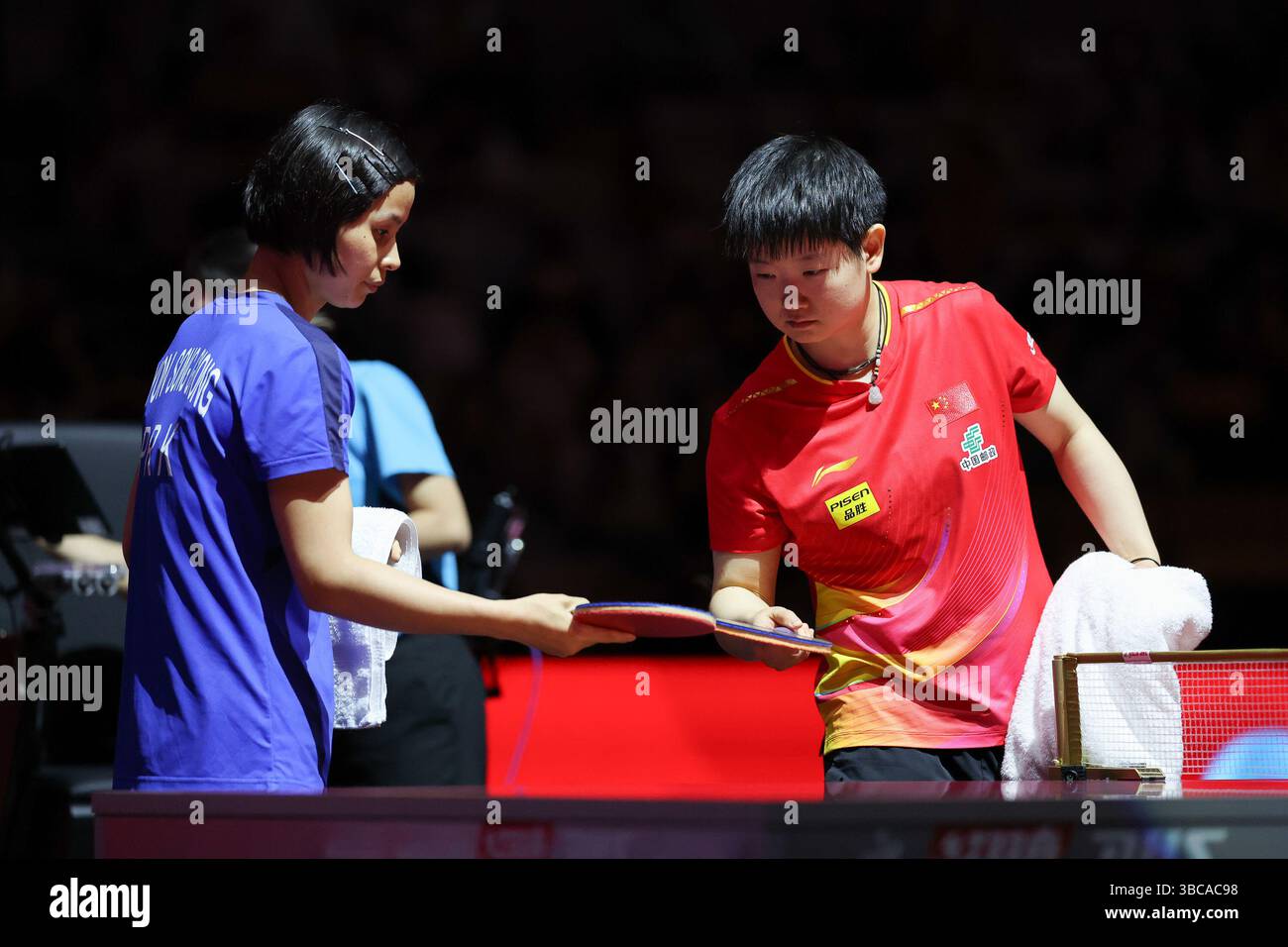 Doha, Qatar. 19th May, 2025. Sun Yingsha (R) of China and Pyon Song ...
