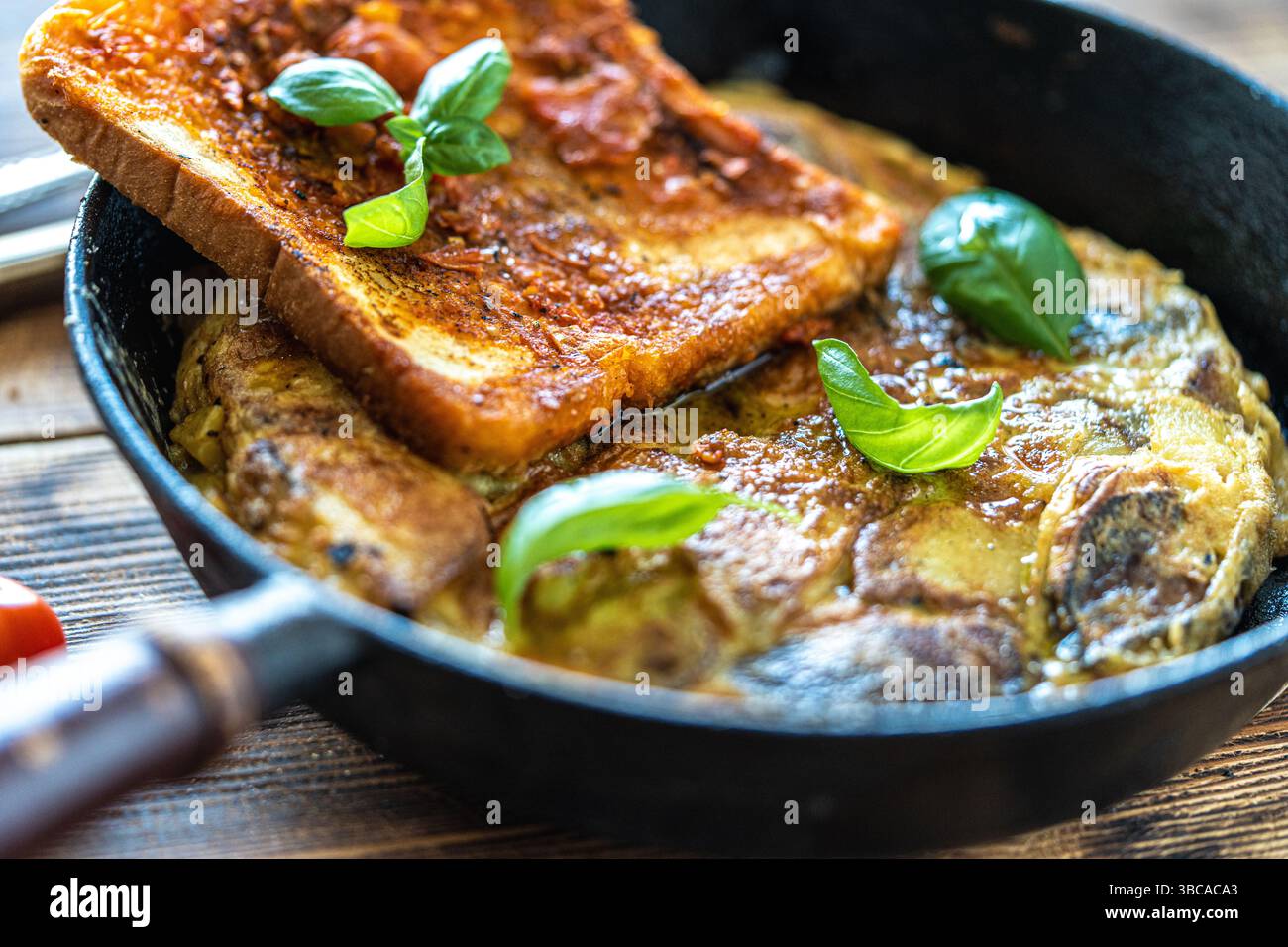 Traditional spanish breakfast potato tortilla and tostado pan con ...