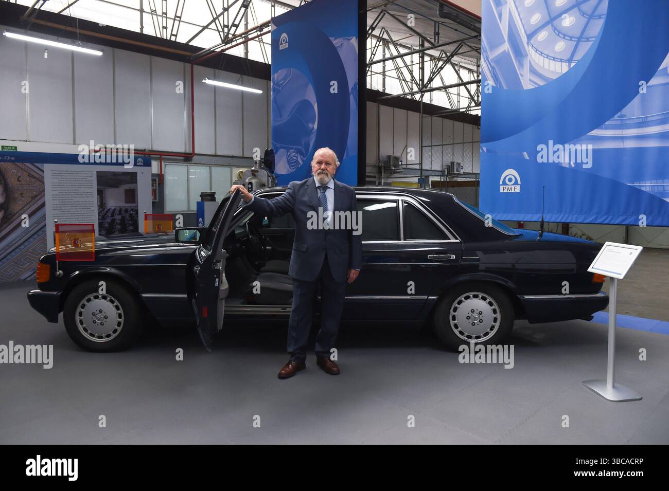 The curator of the exhibition, Manuel Pons, poses after giving ...