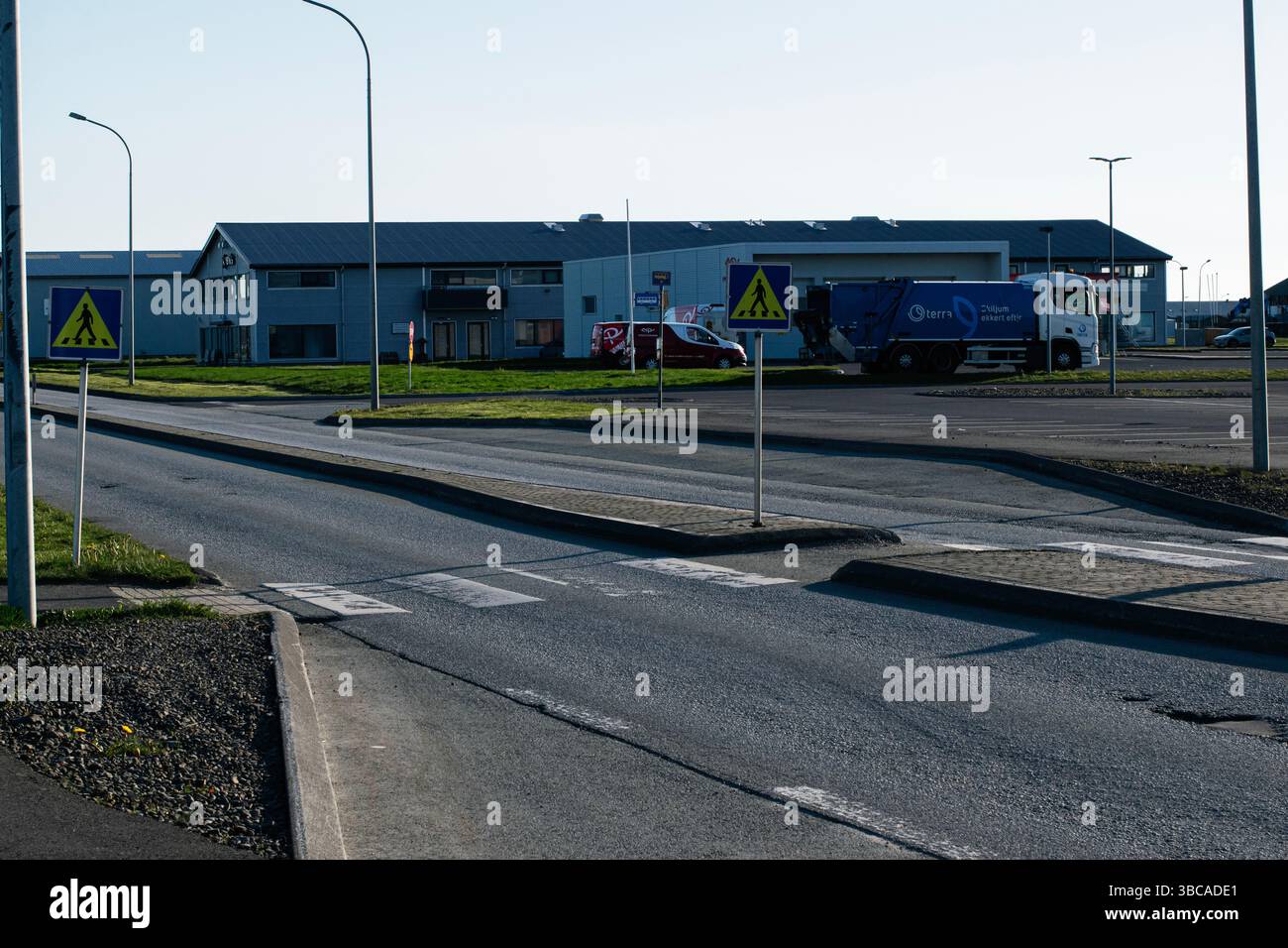 Akranes, Iceland - May 16, 2025: Urban road intersection with buildings ...