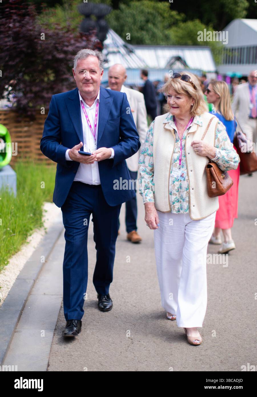 Piers Morgan (left) with a guest at the RHS Chelsea Flower Show at the ...