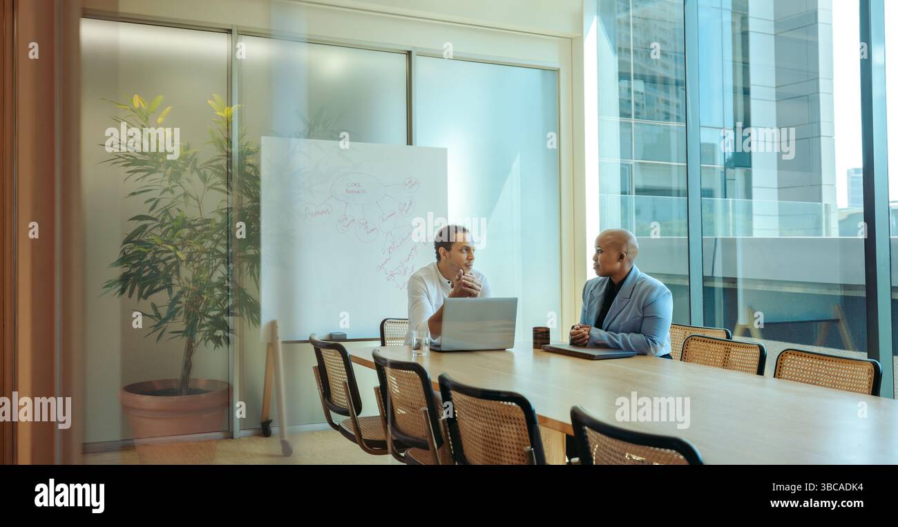 Two male professionals engage hi-res stock photography and images - Alamy