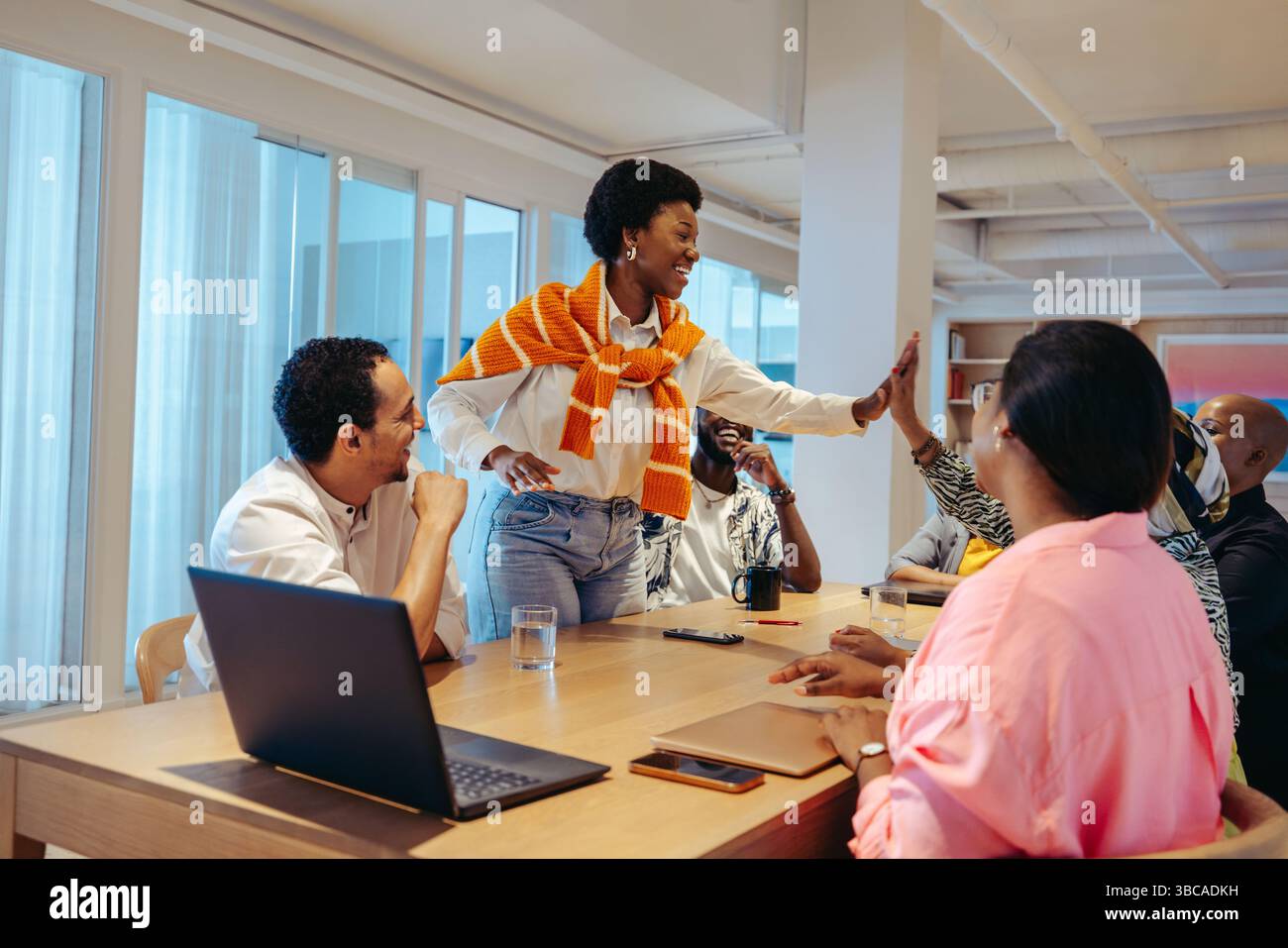 Business team celebrates successful project hi-res stock photography ...