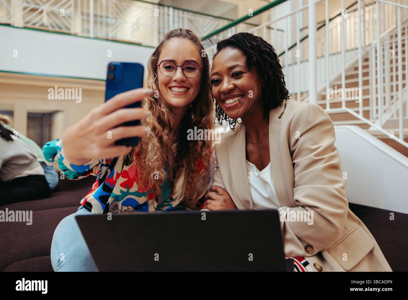 Two joyful women smiling hi-res stock photography and images - Alamy