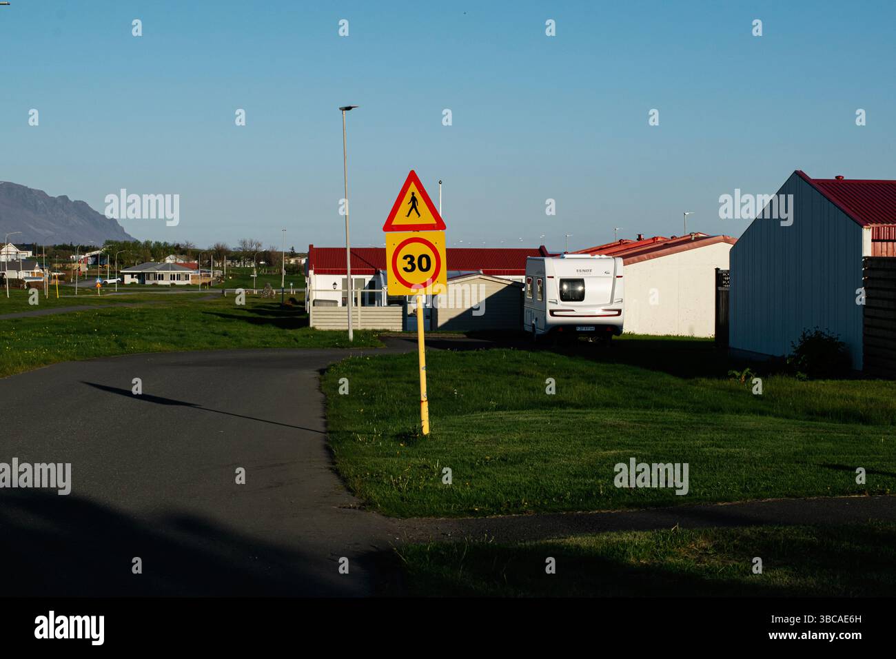 Akranes, Iceland - May 16, 2025: A quiet suburban road in Akranes ...