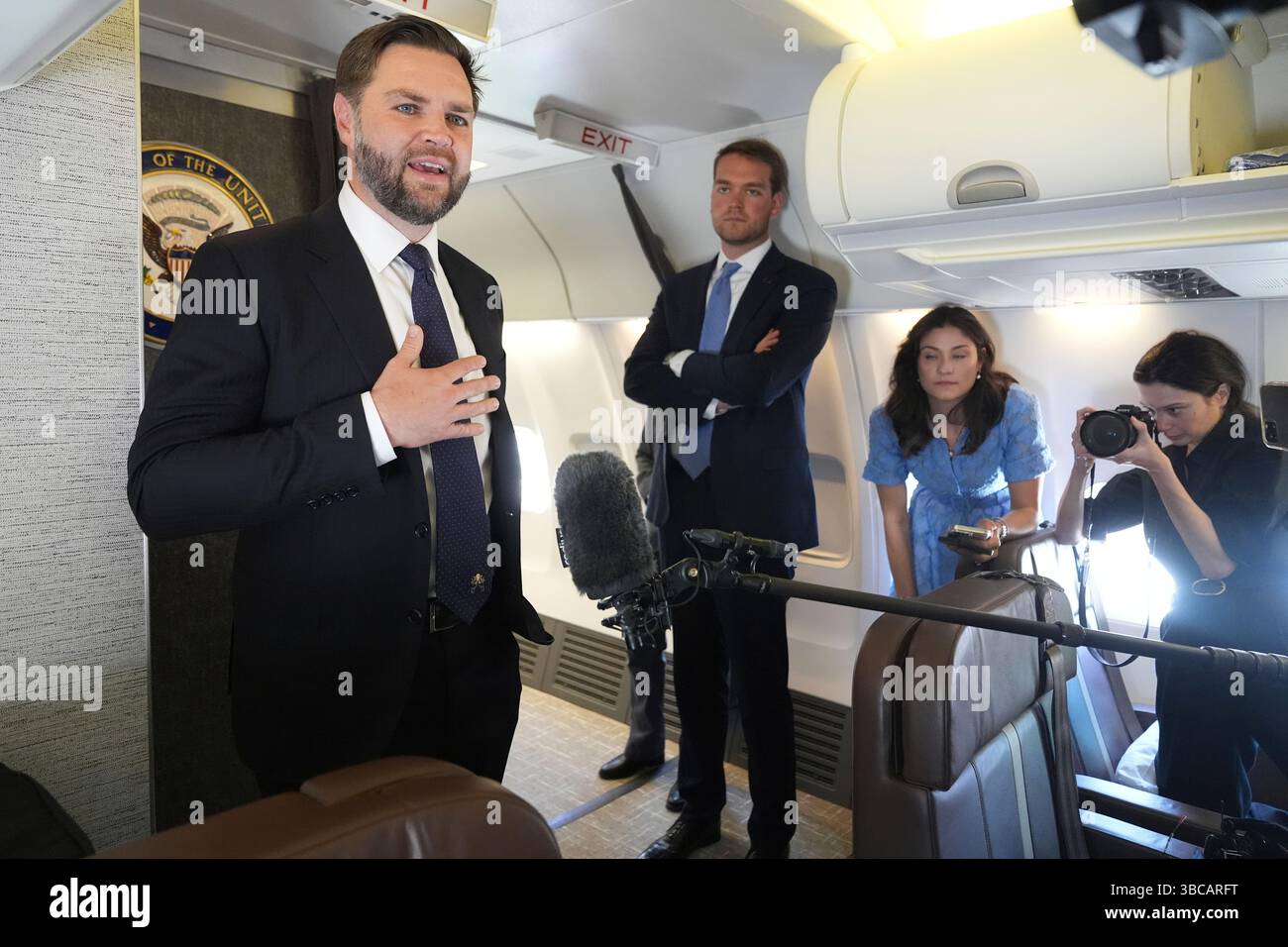 Vice President JD Vance talks to reporters on board Air Force Two at ...