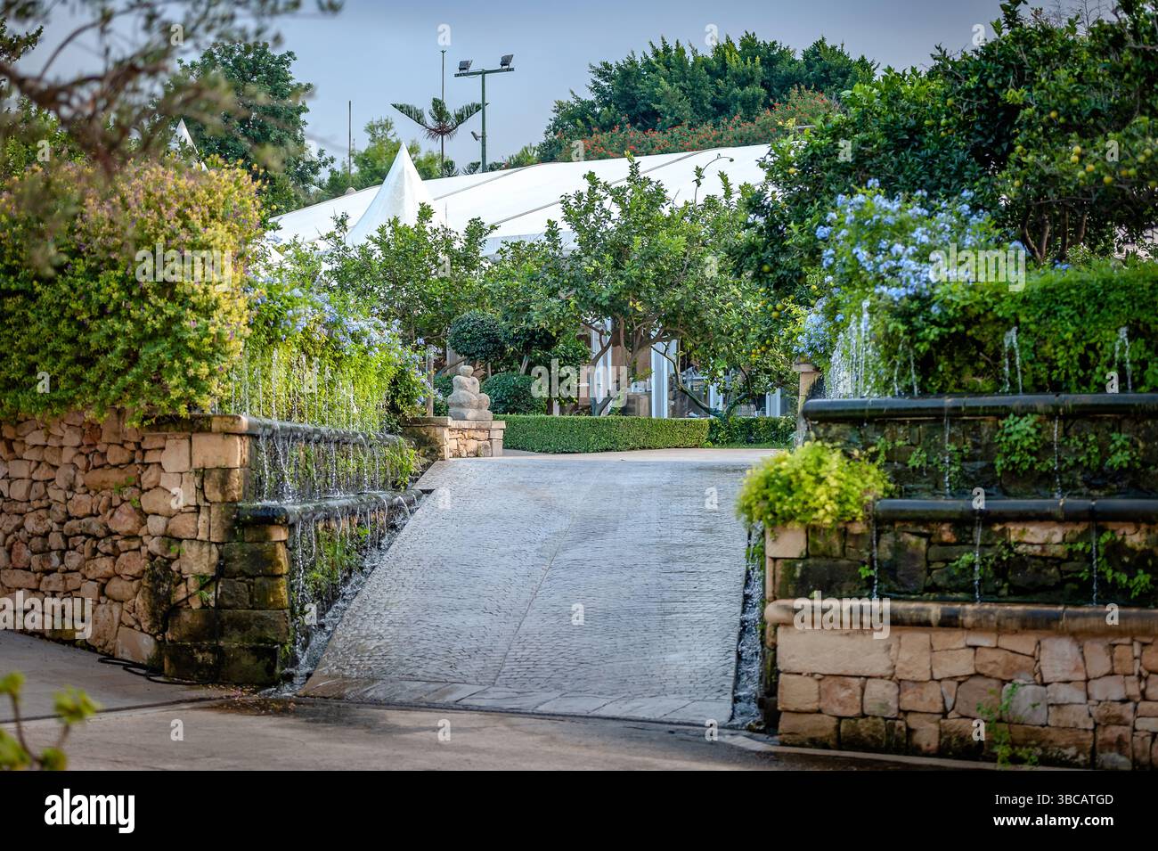 Cascades and flowering trees in the Limestone Heritage Park and Gardens ...