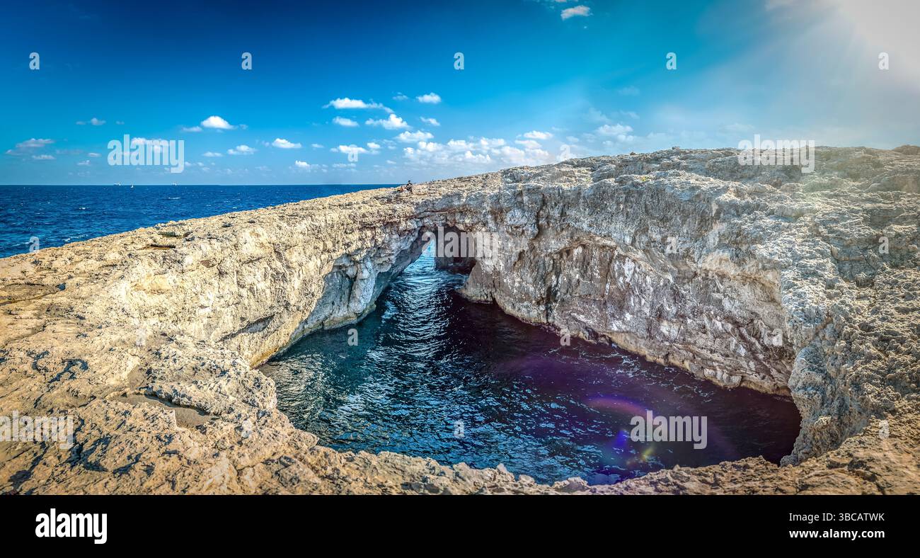 Coral Lagoon with natural arch formation in Northern Malta, Mellieha ...