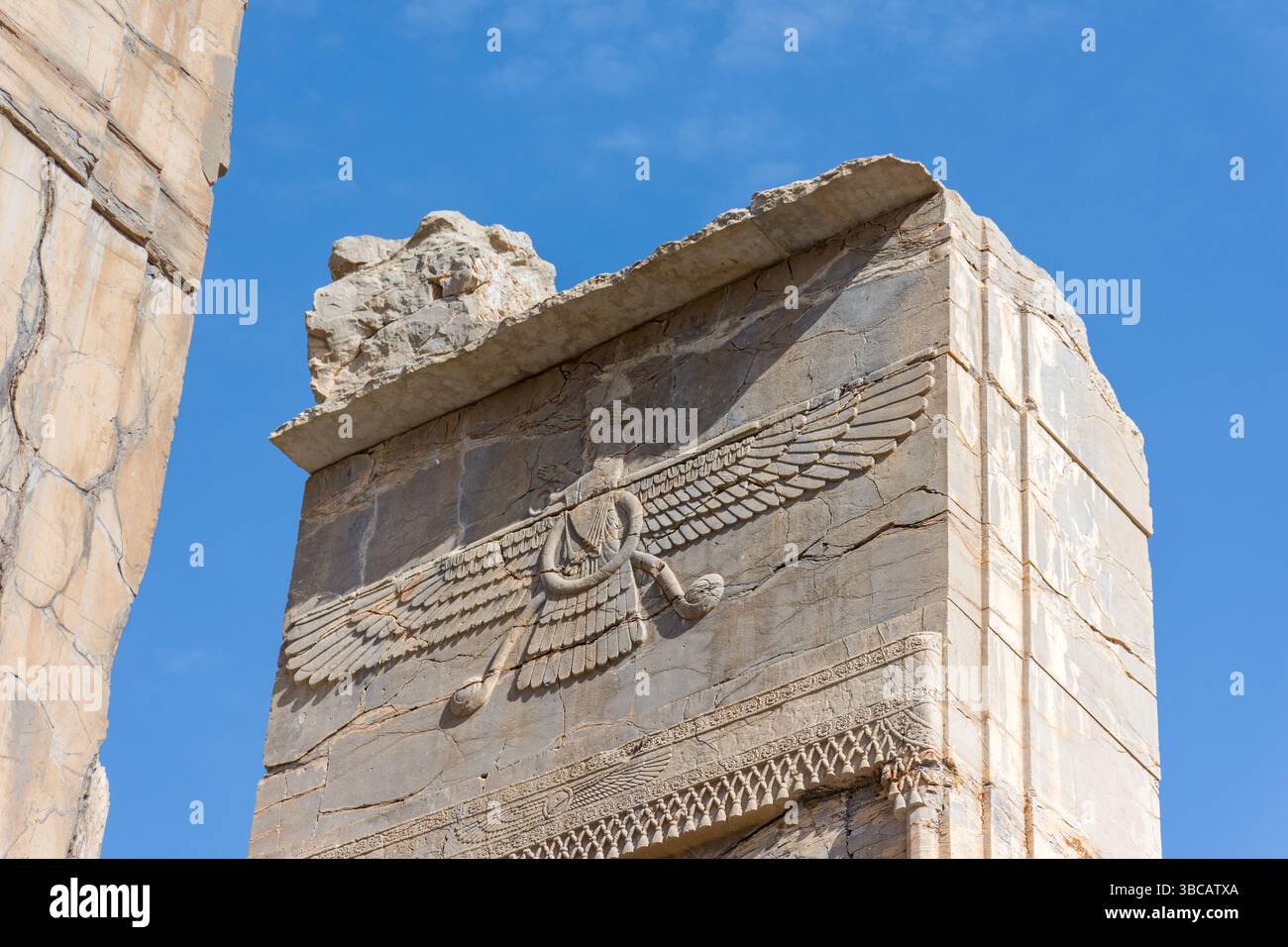 Zoroastrian symbol on pilar at Persepolis palace in Iran Stock Photo ...
